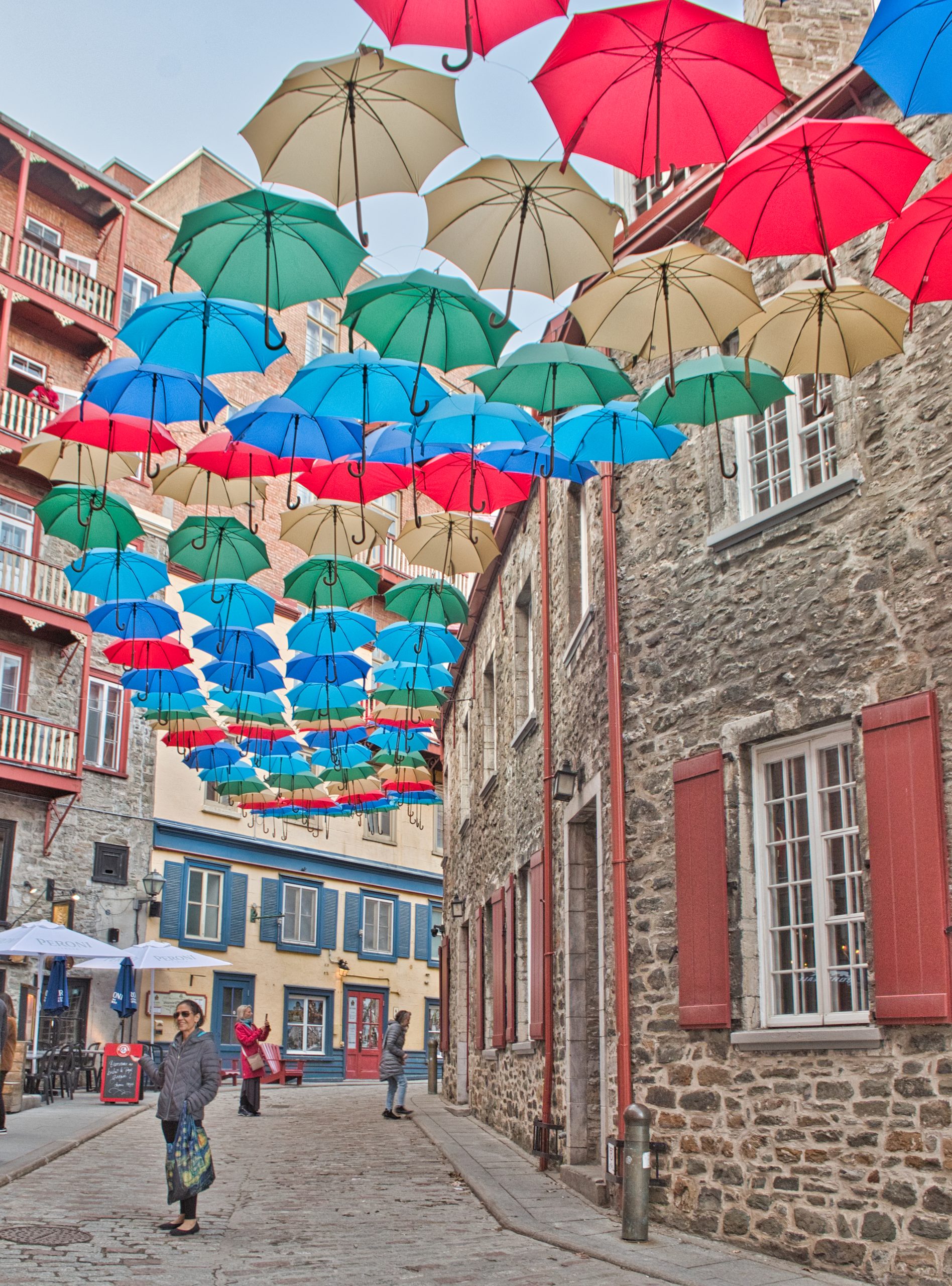PHOTO: A phalanx of colourful umbrellas brightens Rue du Cul-de-Sac ...